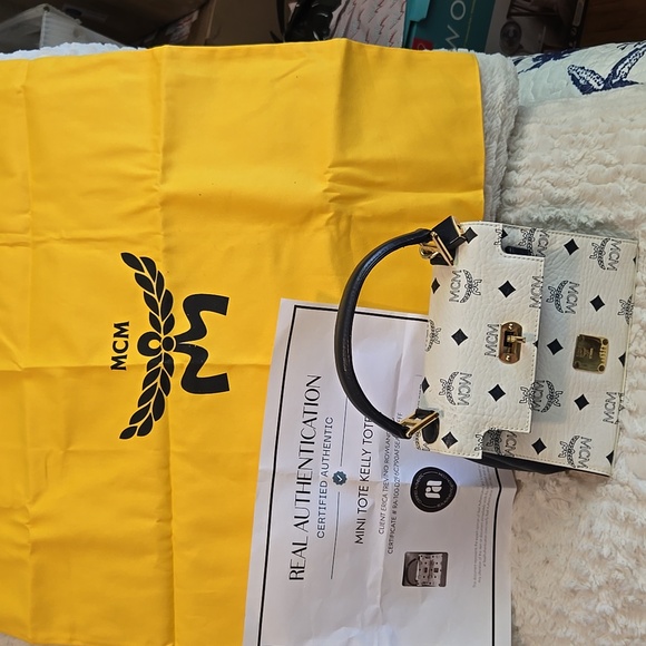 MCM | Bags | Mcm Cream And Navey Blue Mini Tote With Lock And Key Will ...